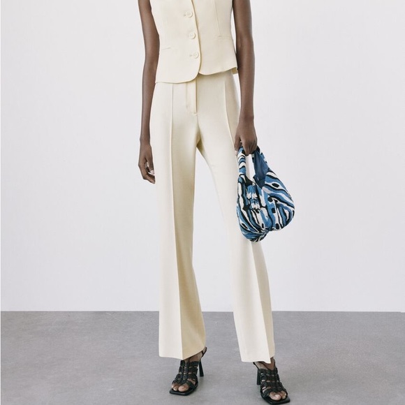 Zara | Pants & Jumpsuits | Zara Ivory Cream Flared Pressed High Waisted ...